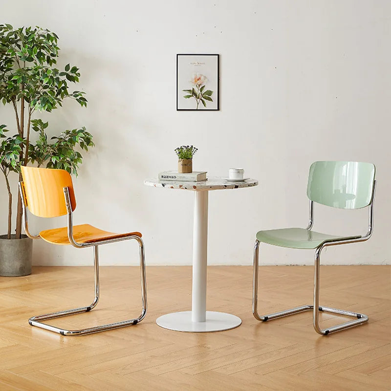 Modern Retro Dining Chairs With Chrome Accents on Luulla